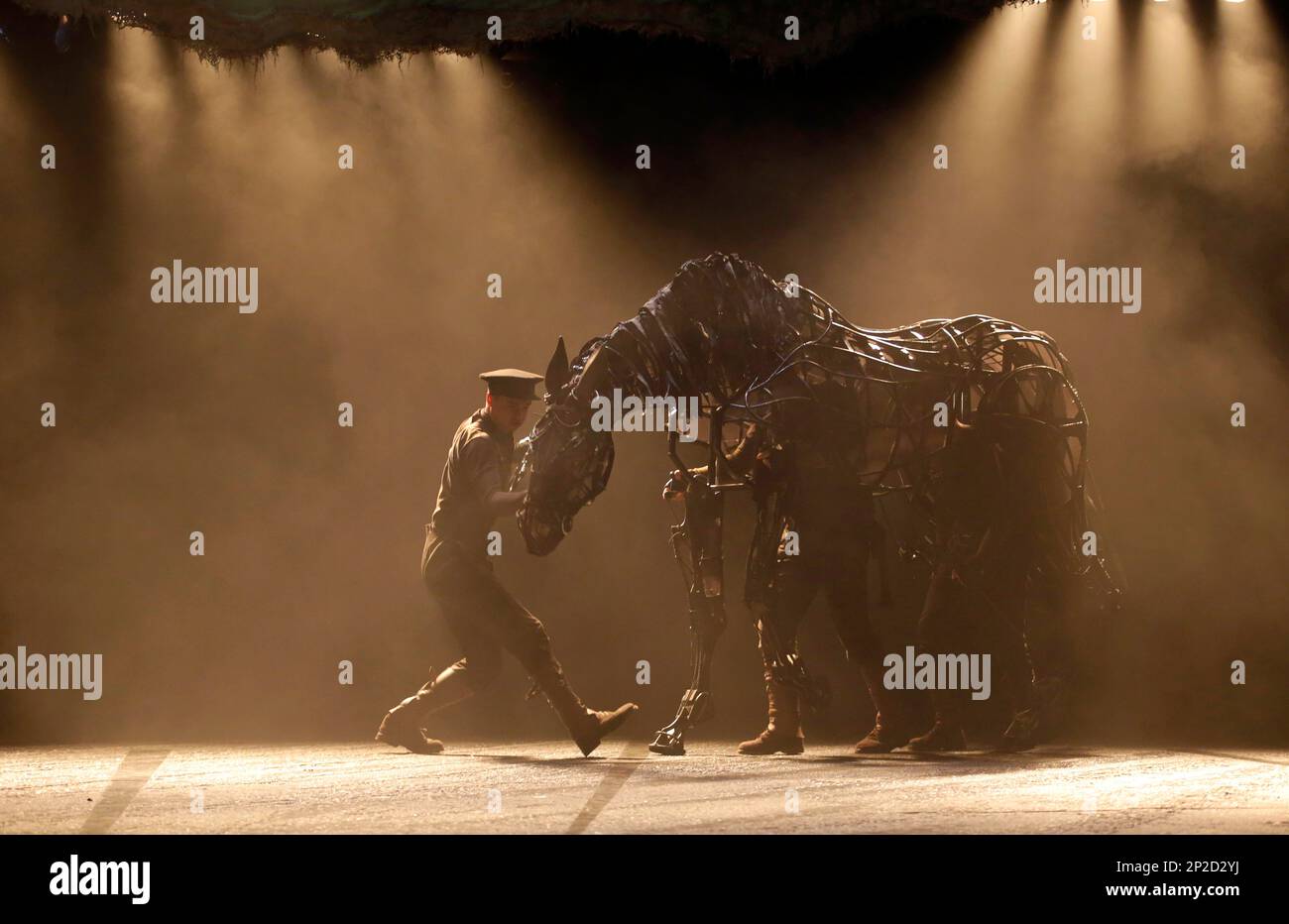 A Chinese actor plays the horse prop from the Chinese theatre ...