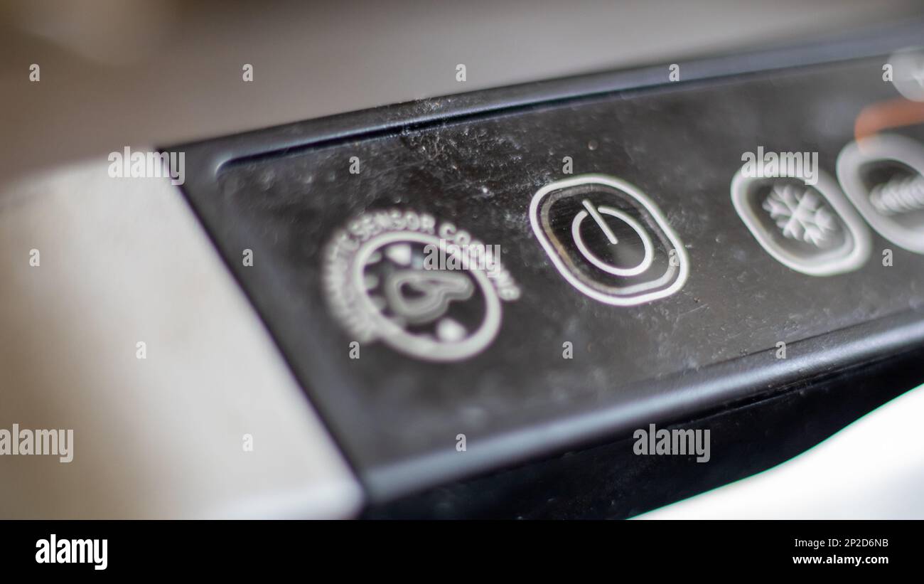 Electric grill power adjustment indicators and power button. The degree ...