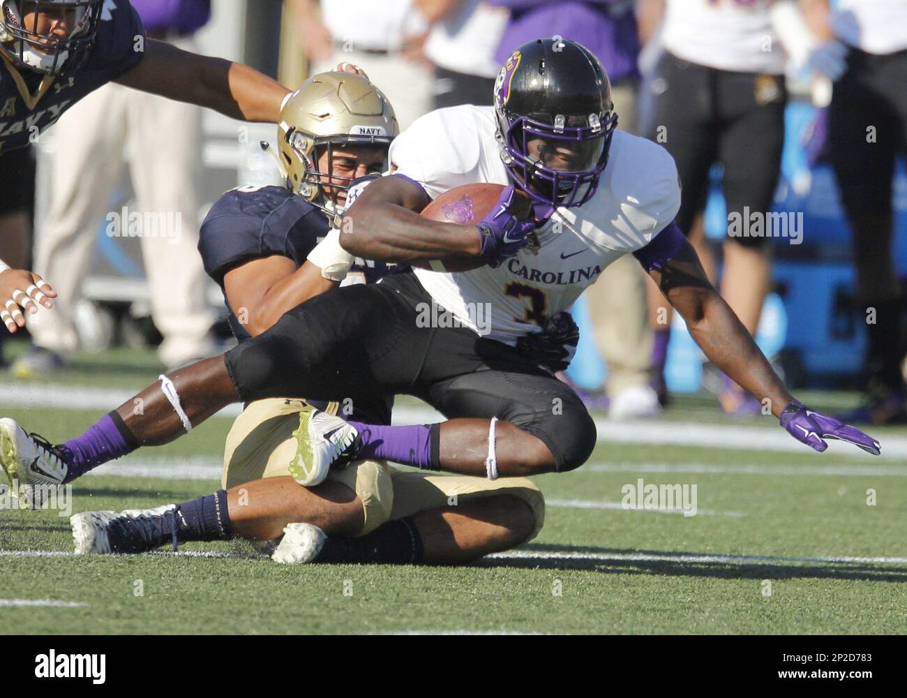 19 September 2015: Navy's Daniel Gonzales (58) tackles East Carolina's ...