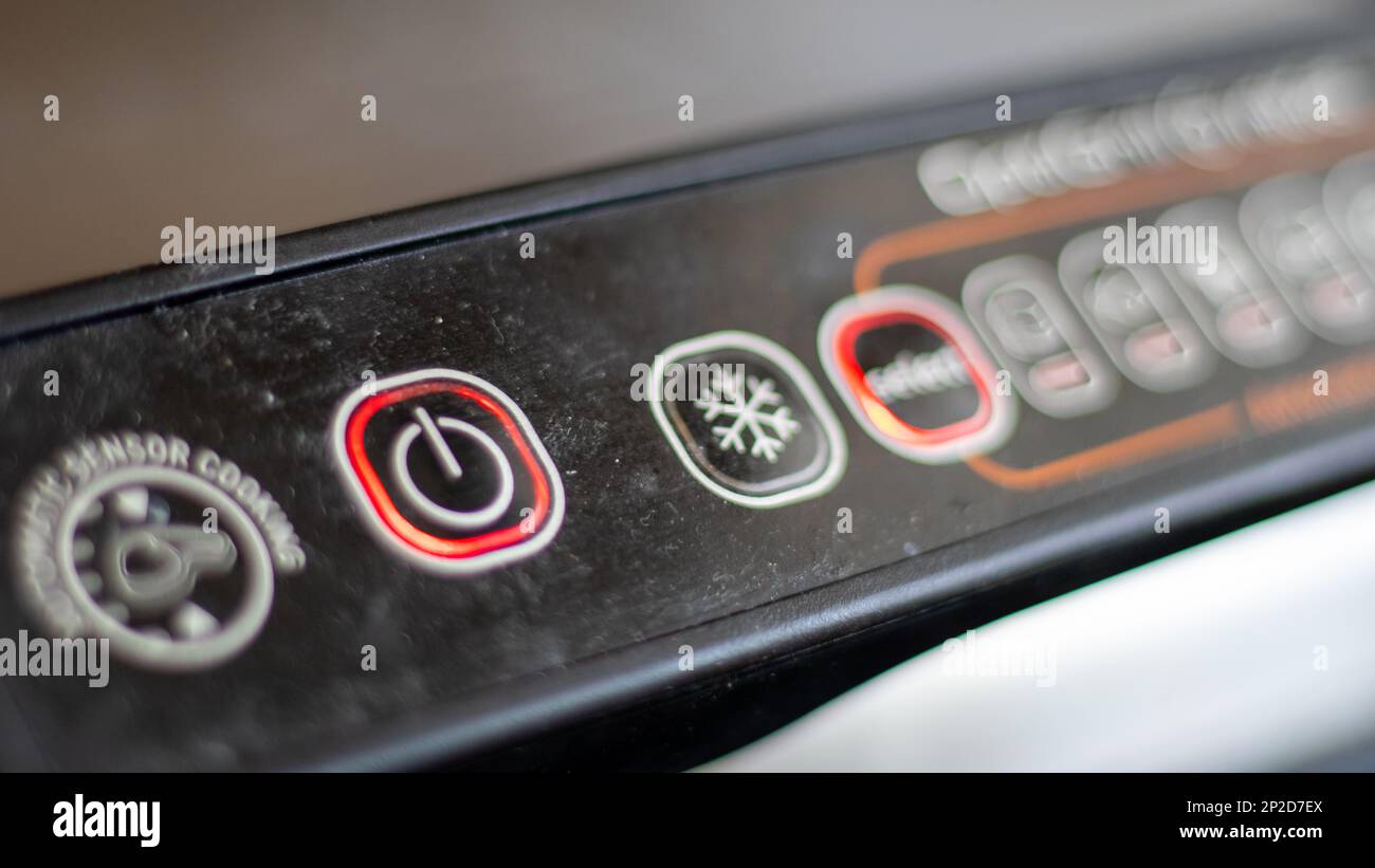 Electric grill power adjustment indicators and power button. The degree ...