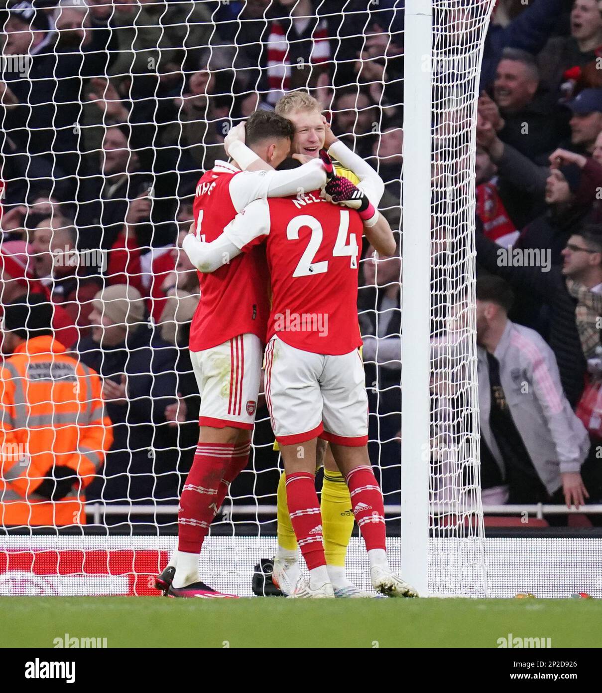 Arsenal goalkeeper Aaron Ramsdale celebrates with Ben White and Reiss ...