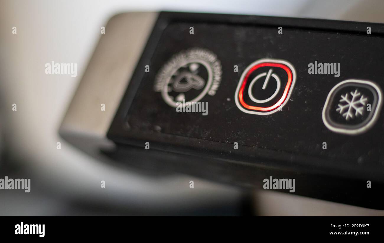 Electric grill power adjustment indicators and power button. The degree ...