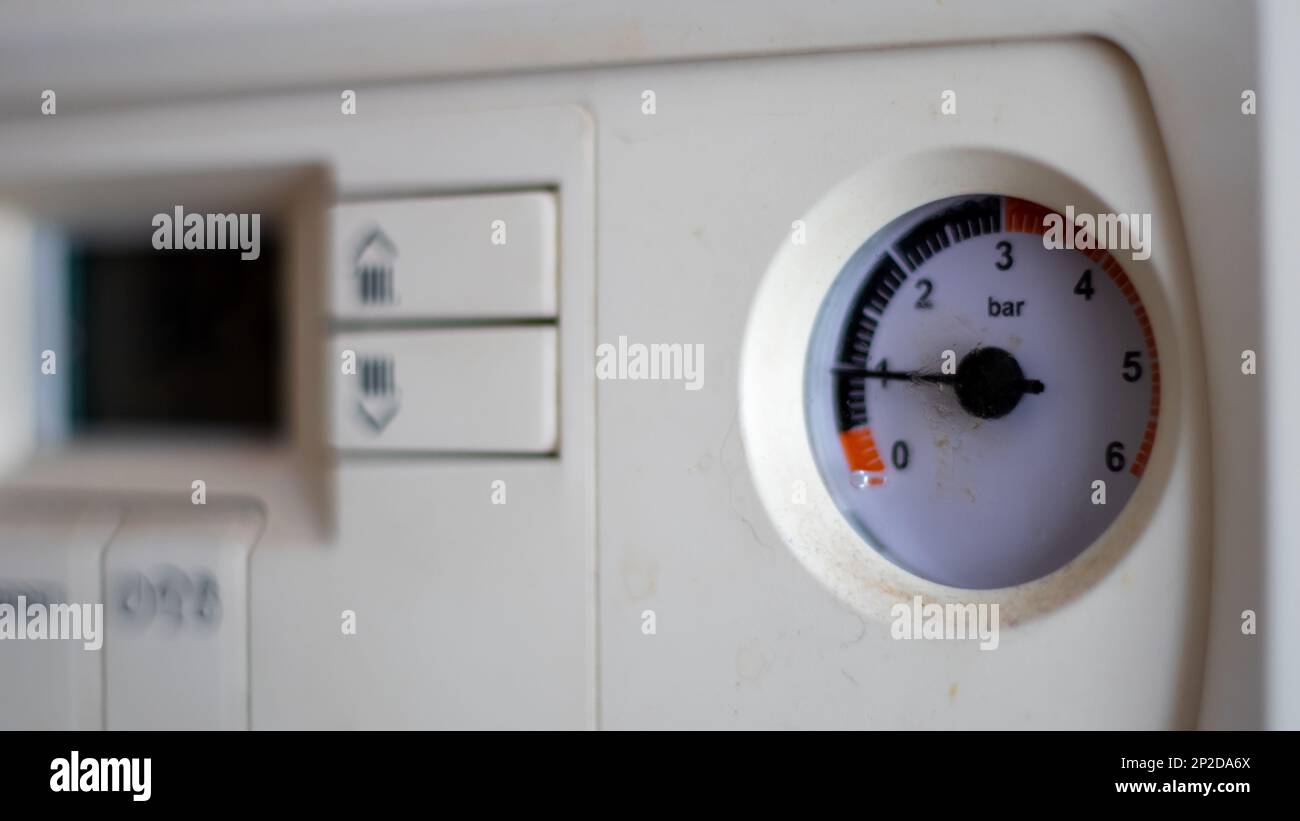 Gas pressure meter on the panel of the heating gas boiler. Symbolic ...
