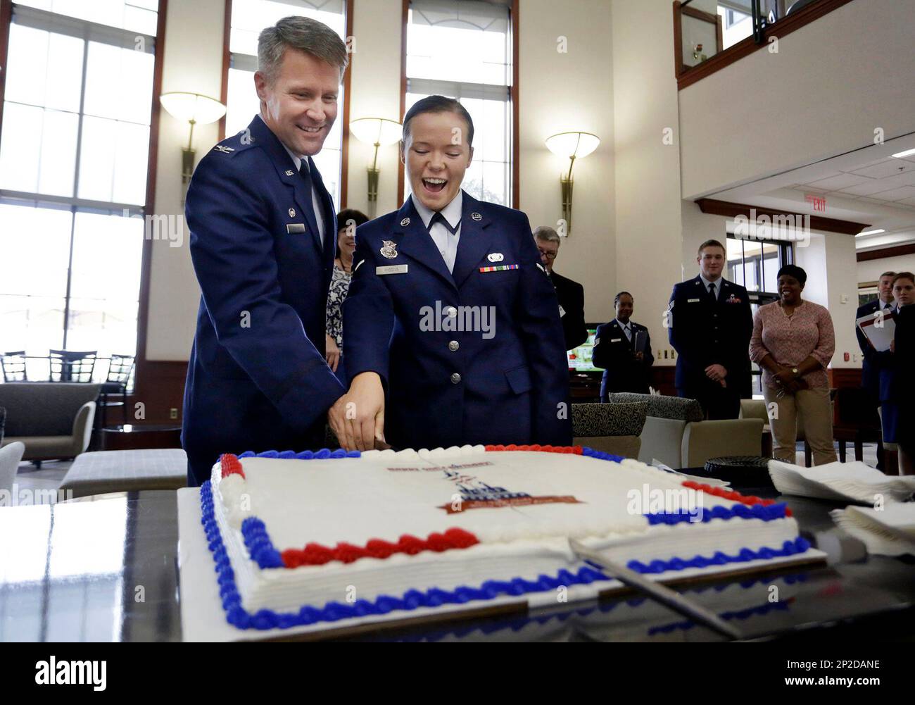 Sixth Air Mobility Wing Commander Dan Tulley, left, and Airman ...