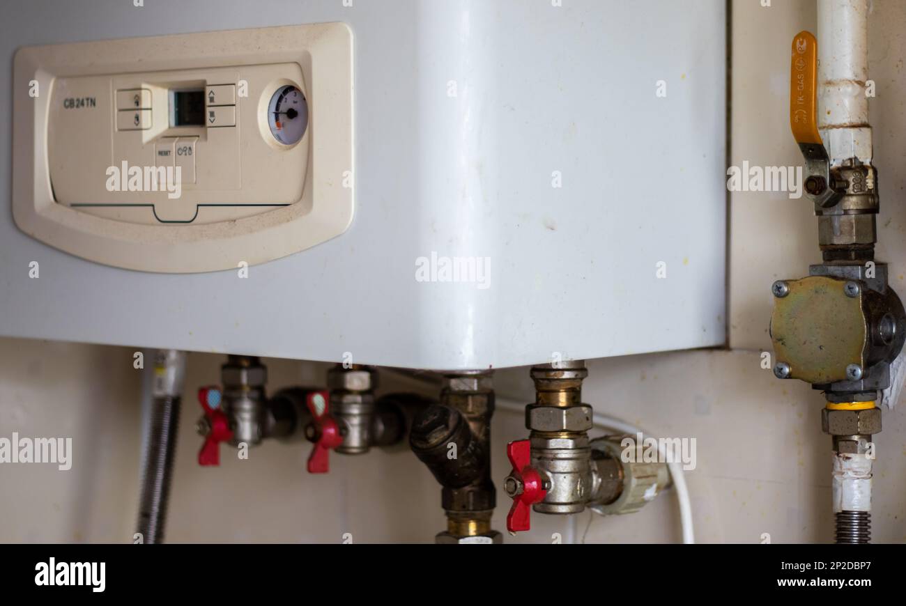 Heating gas boiler. Symbolic image of the heating season at home. The ... Heating gas boiler. Symbolic image of the heating season at home. The ...