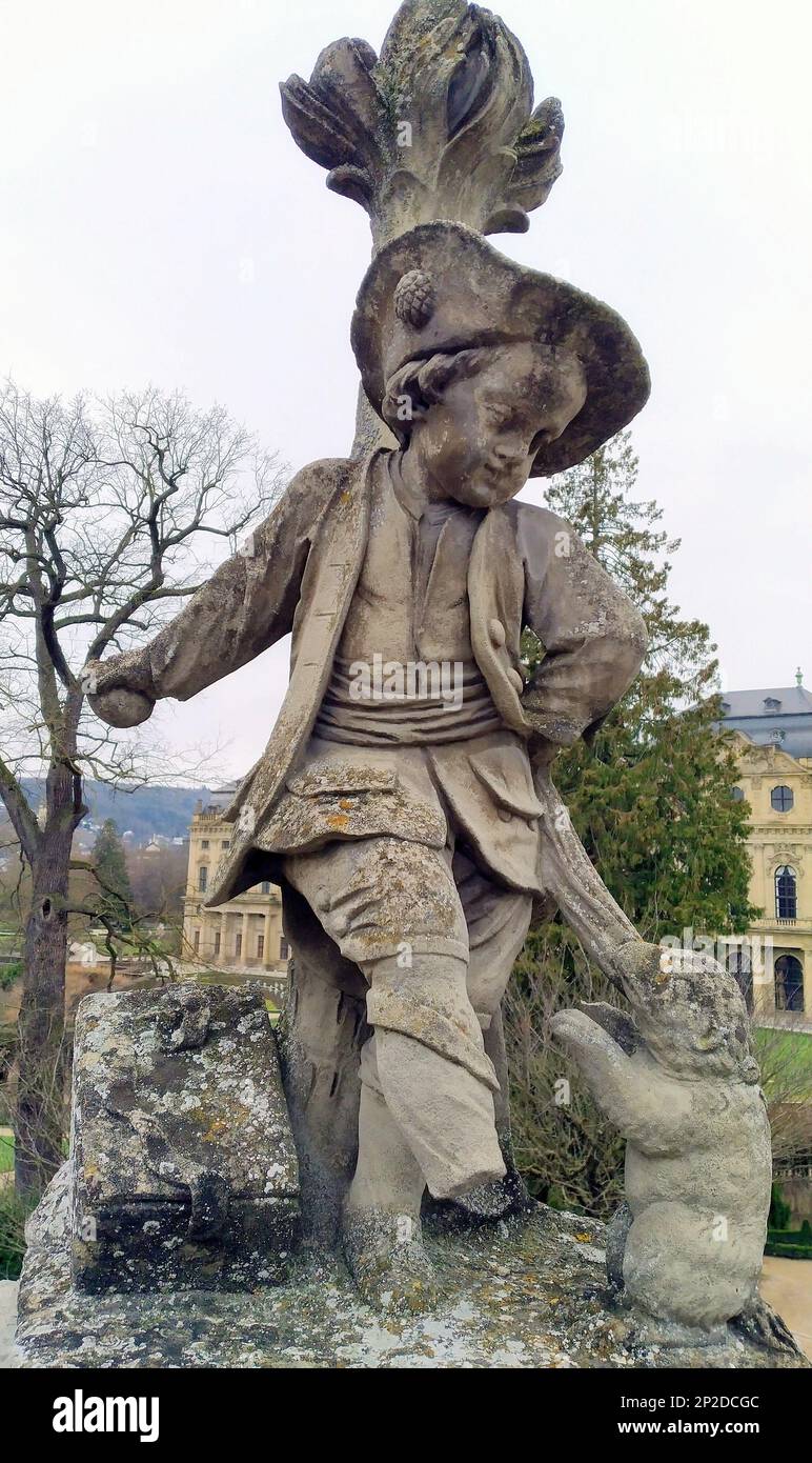 Sculpture of a putto playing with a gopher, in the Court Gardens of the ...
