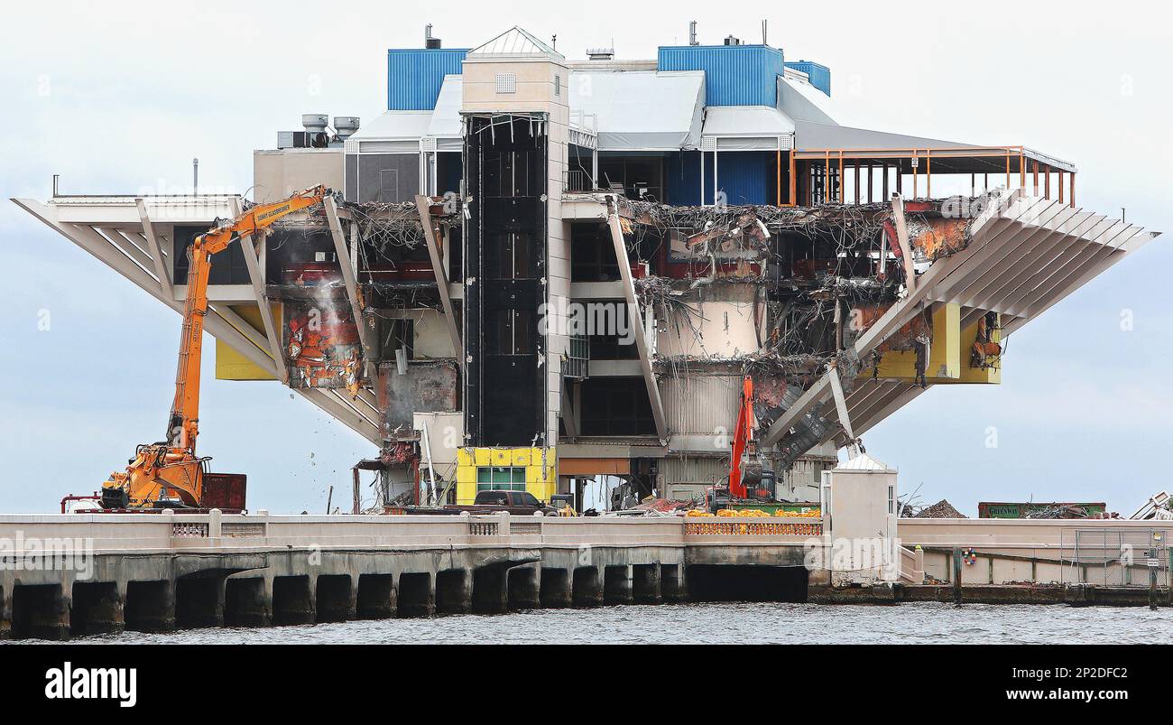 Workers for Sonny Glasbrenner Inc., of Clearwater, demolish slabs of ...