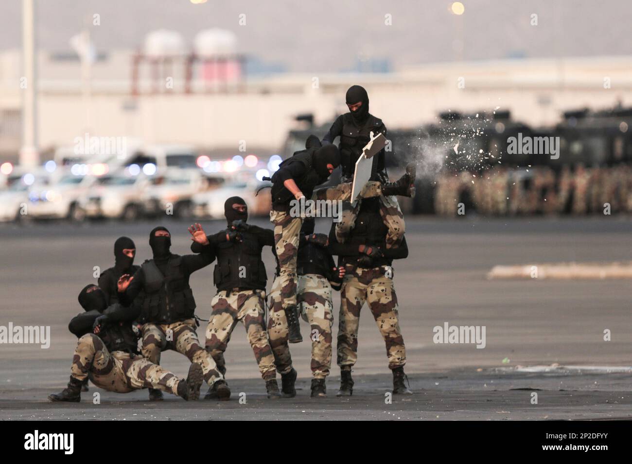 Saudi security forces take part in a military parade in preparation for ...