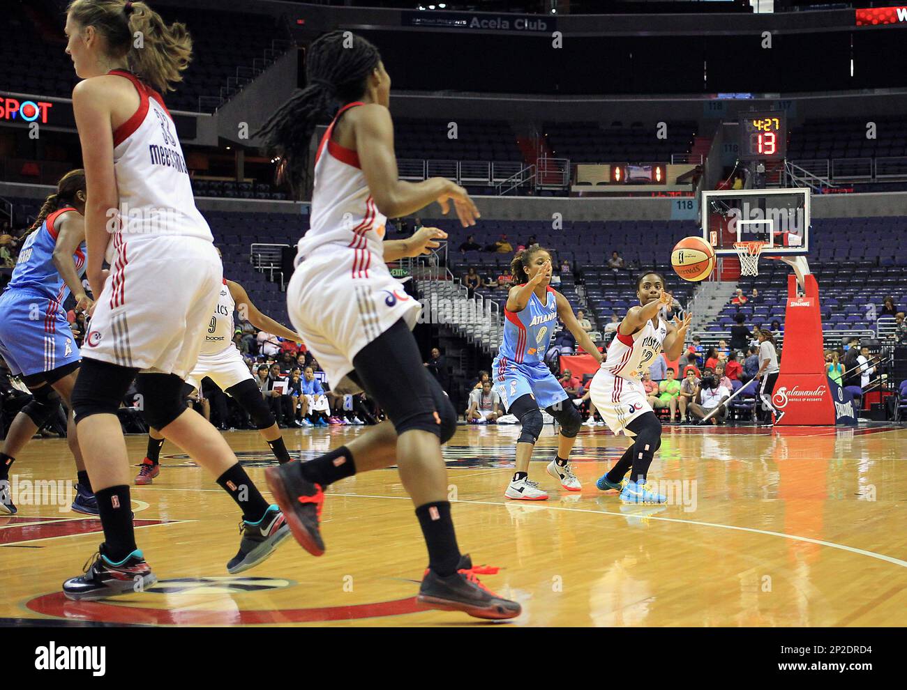 September 13 2015: Washington Mystics guard Ivory Latta (12) passes to ...