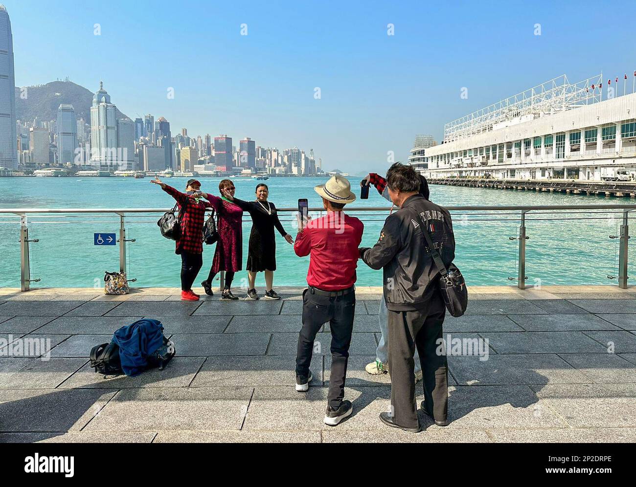Zhongshan traveller Wang Yu (far left) did not know the mask mandate ...