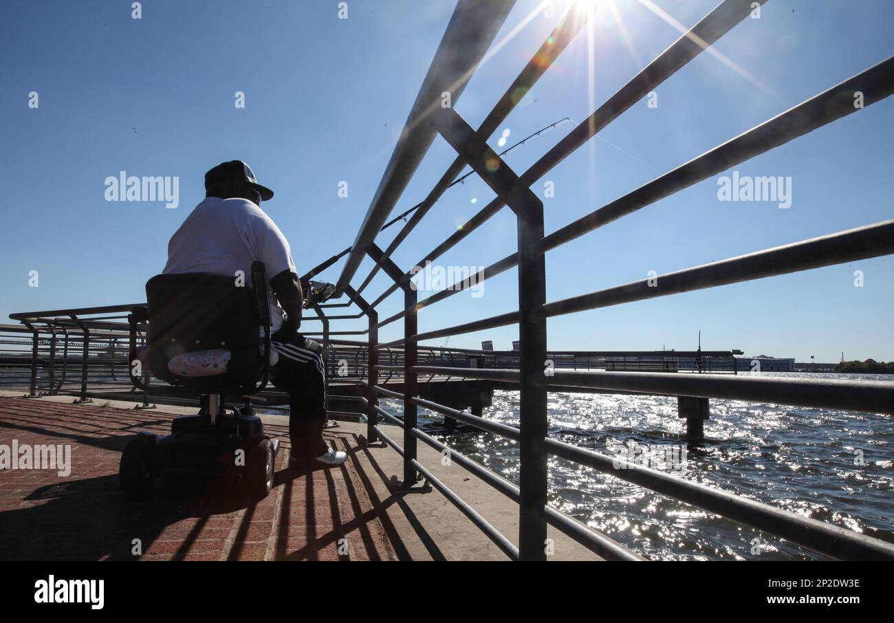 Stanley Shanks, 60, fishes in the Delaware River in South Camden, N.J ...