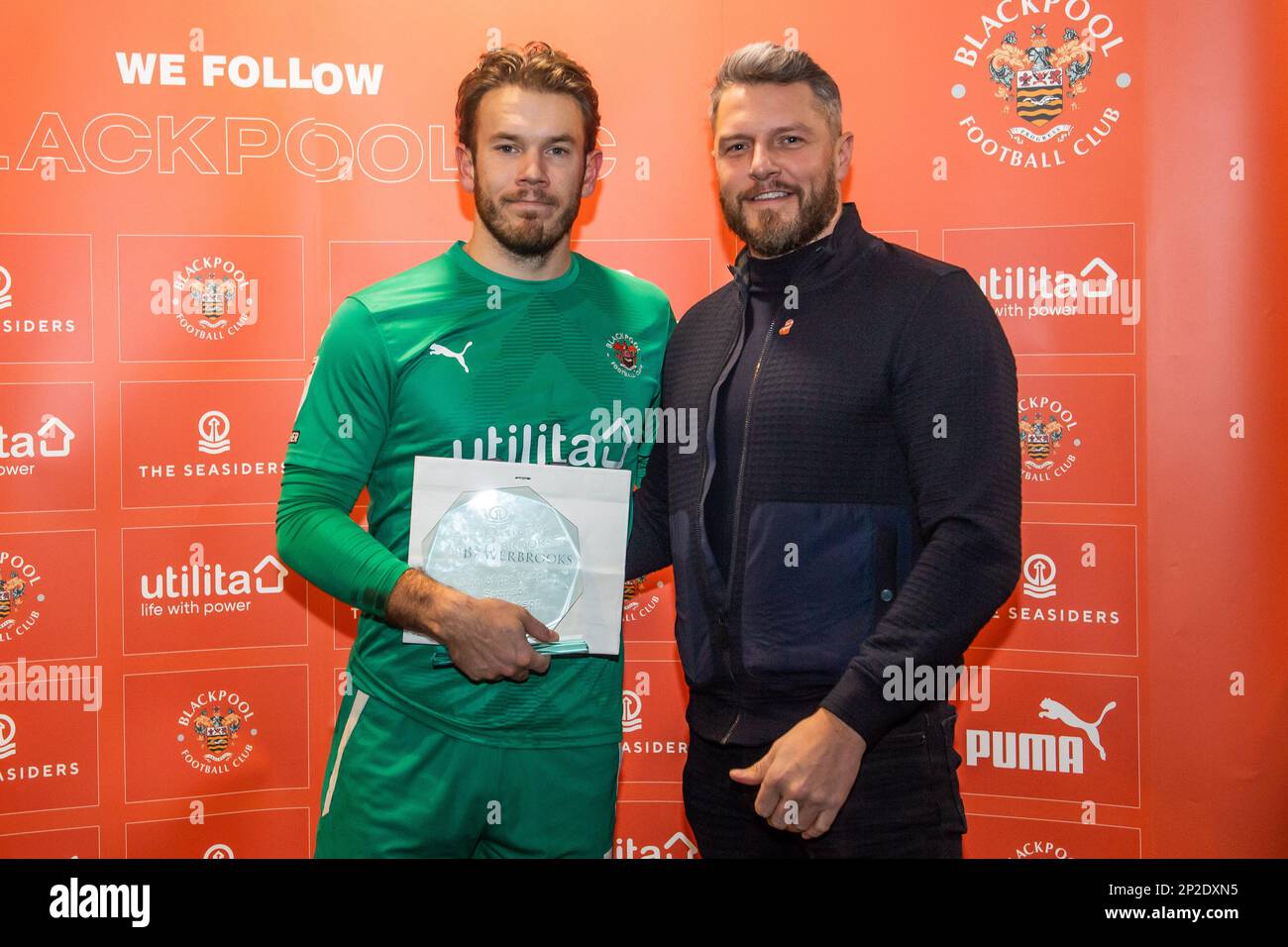 Chris Maxwell #1 of Blackpool receives the man of the match award ...