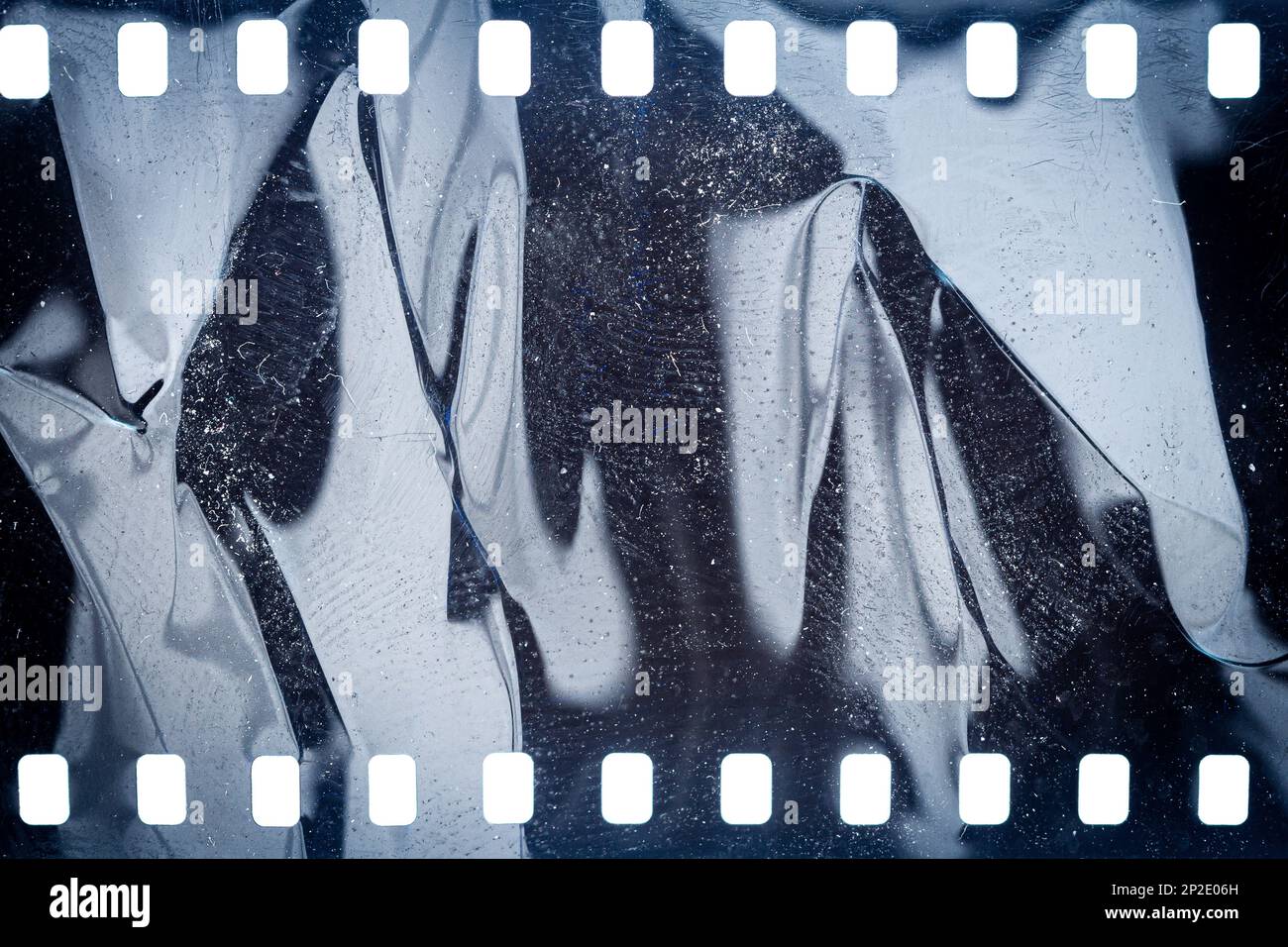Dusty and grungy 35mm film texture or surface. Perforated scratched ...