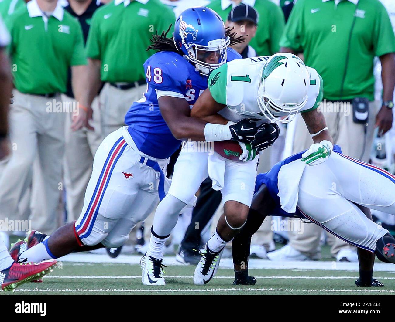 September 12, 2015: North Texas WR Turner Smiley (1) gets stopped by ...