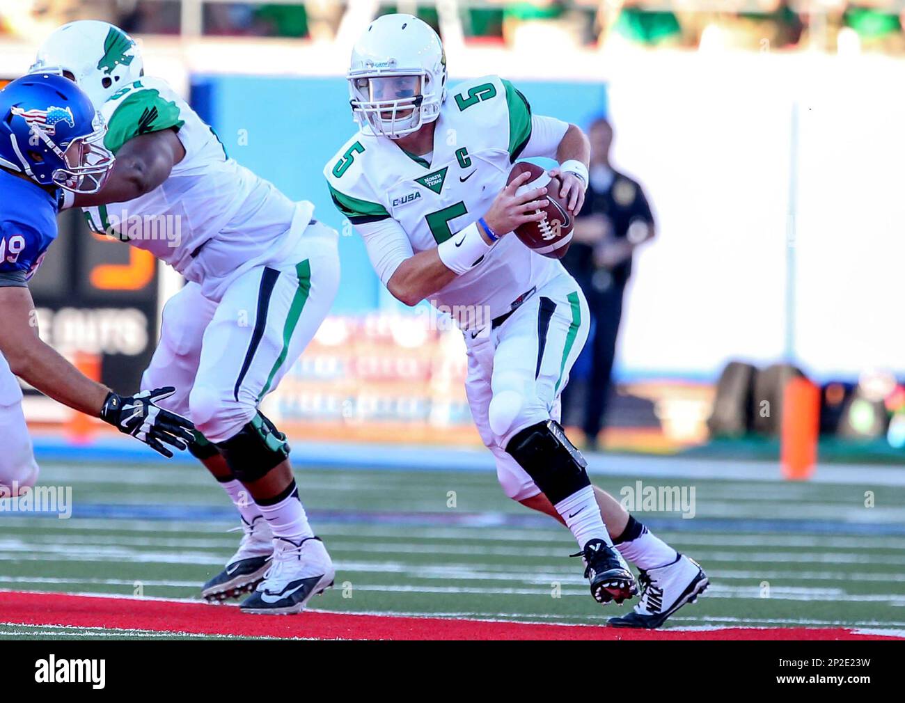 September 12, 2015: North Texas QB Andrew McNulty looks to run during ...
