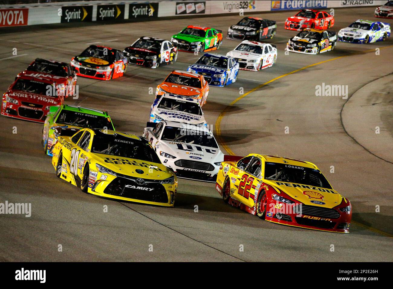 Joey Logano (22) and Matt Kenseth (20) green flag start during the ...