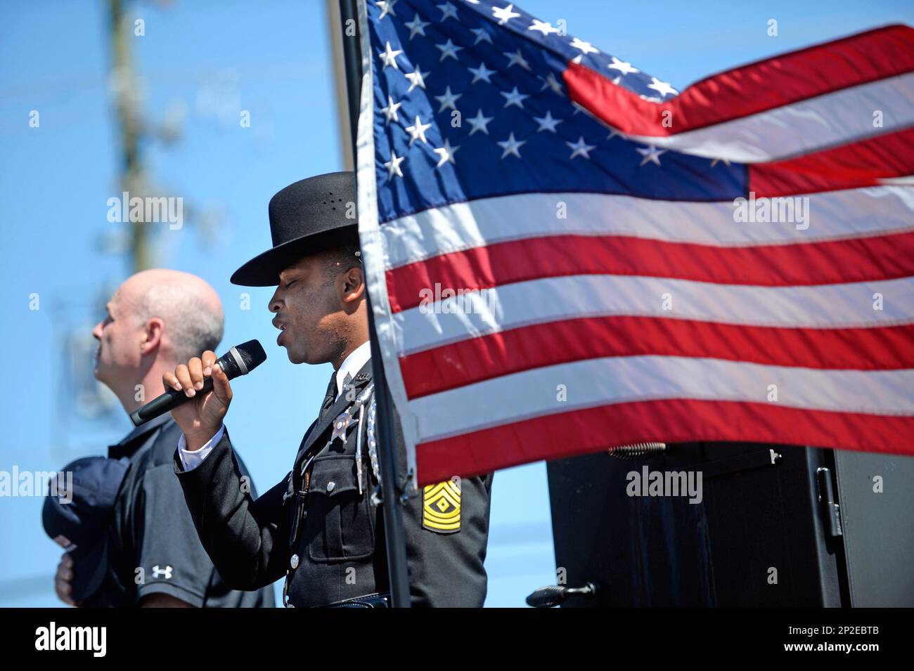 First Sgt. Deuntay Diggs of the Stafford Sheriff's Department sings the ...