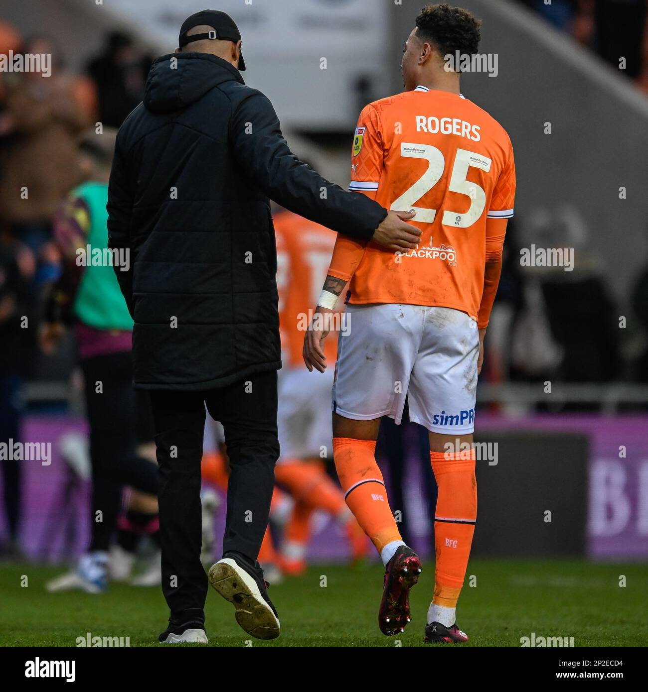 Burnley Manager Vincent Kompany and Morgan Rogers #25 of Blackpool ...