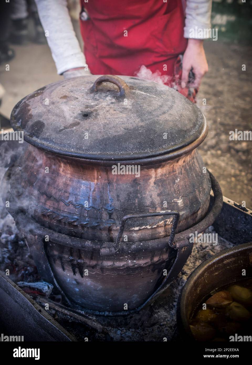 Serbian traditional stew cooked in big pots Stock Photo - Alamy