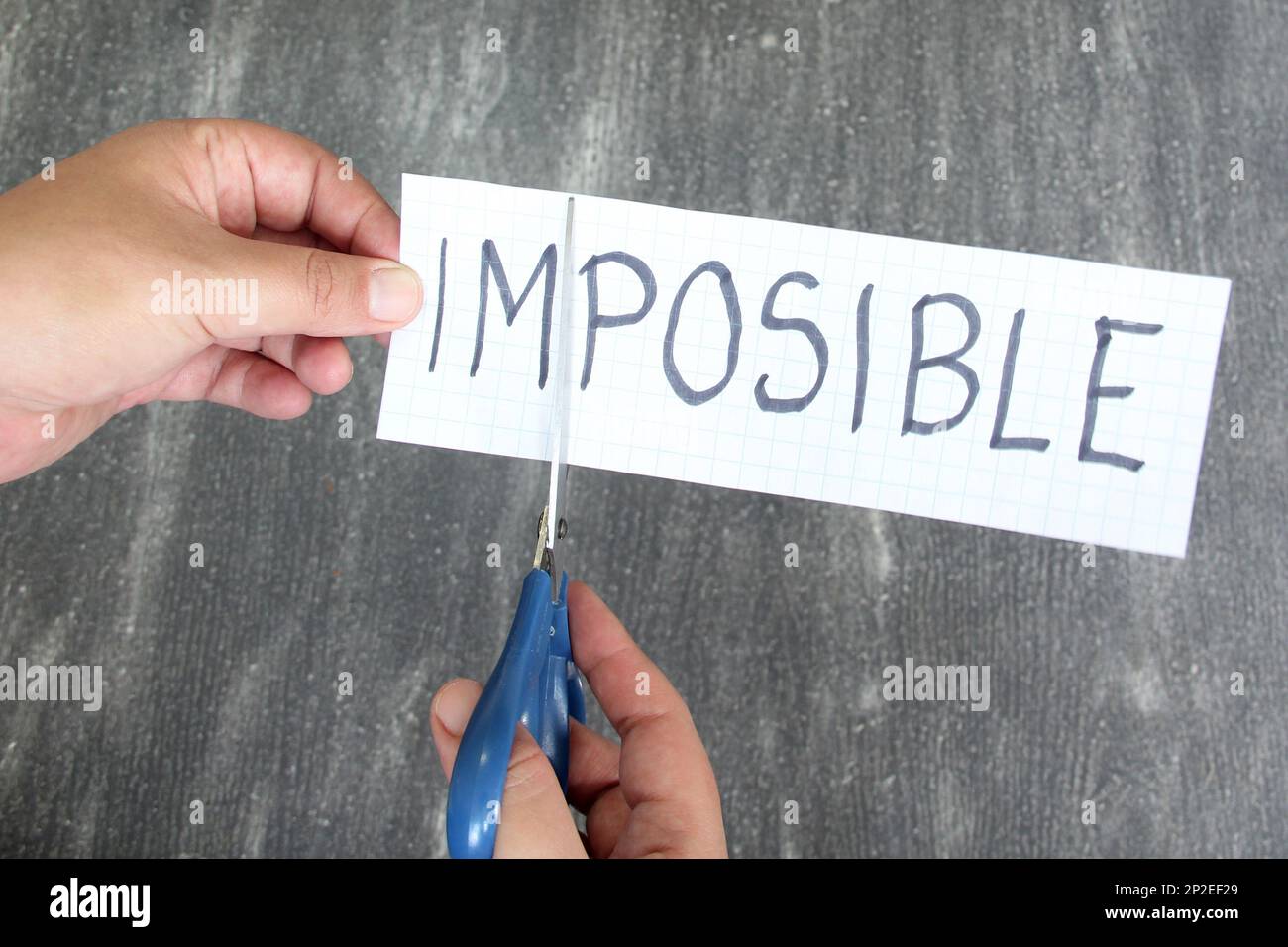 Soing the impossible possible woman hands cutting message in spanish ...