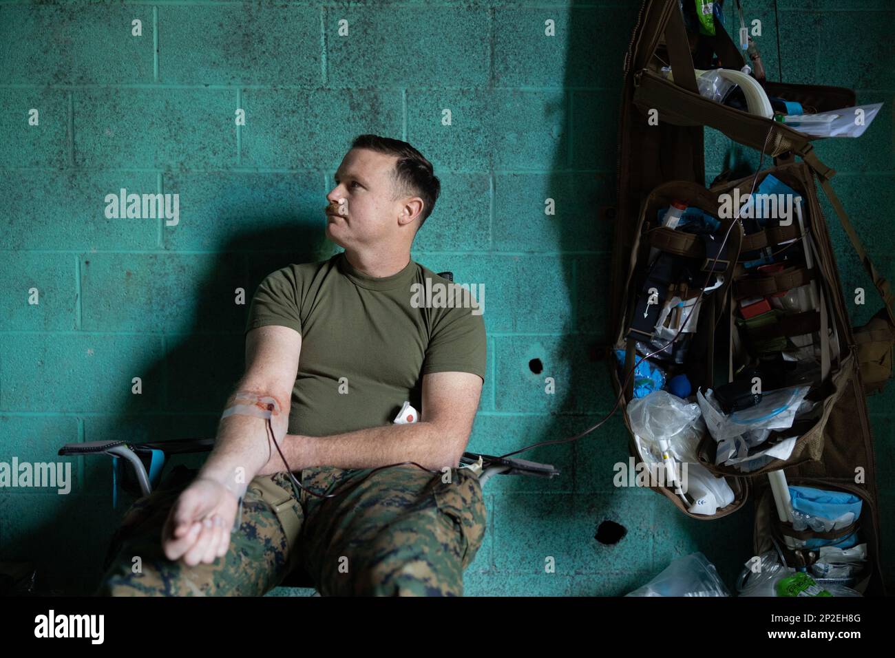 U.S. Navy Hospital Corpsman 1st Class Dustin Alexander, with 2nd ...