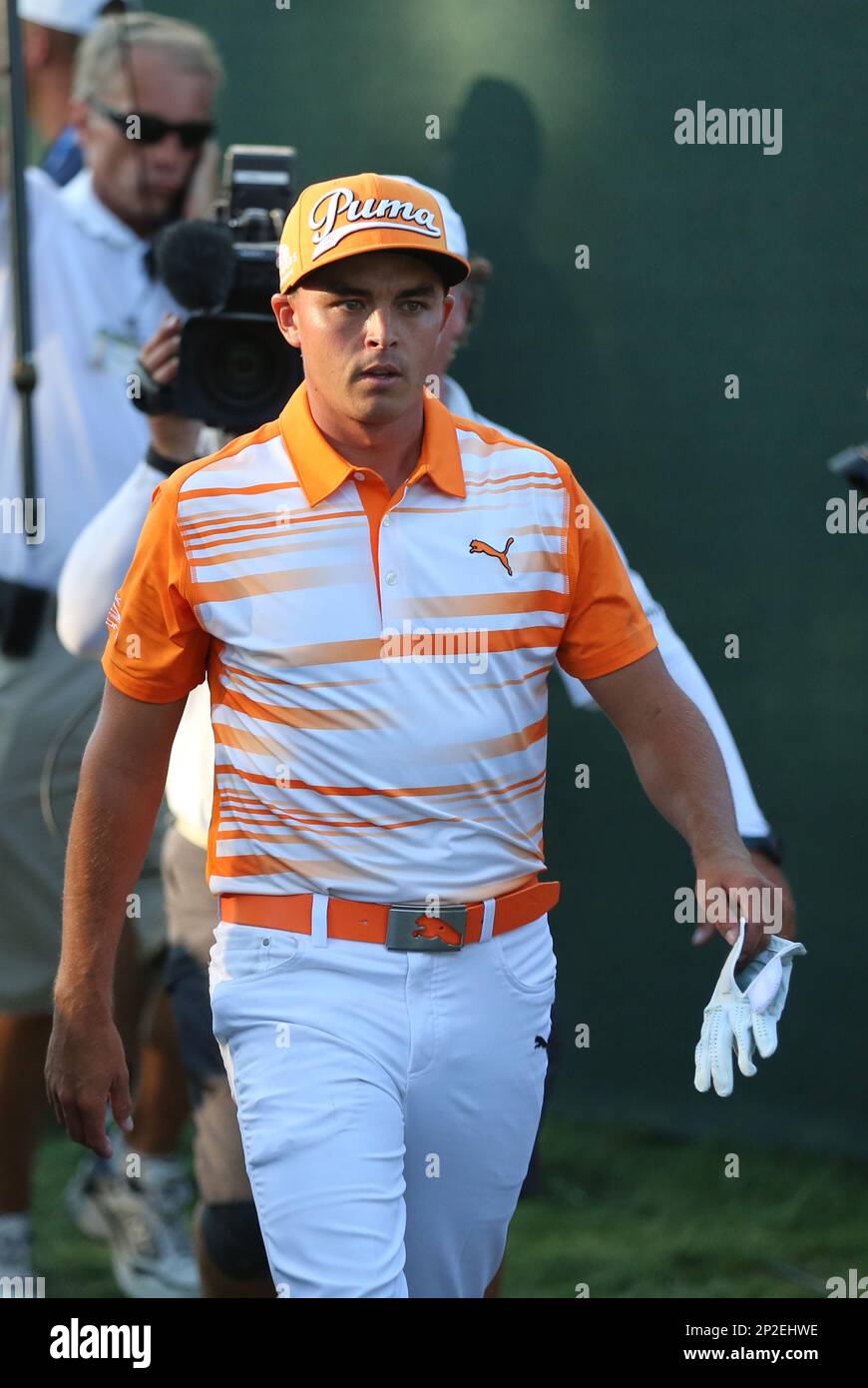 September 7, 2015: Rickie Fowler heads to the 17th tee box with the ...