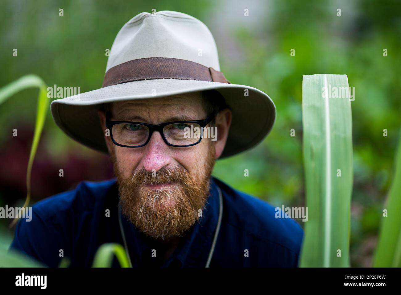 In this photo taken Aug. 25, 2015, David Michener, curator, poses for a ...
