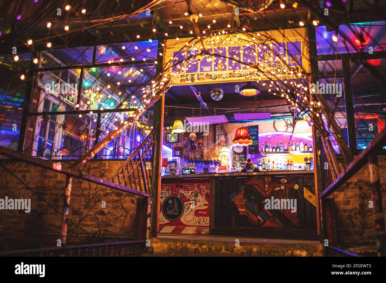 Szimpla Kert, famous Ruin Pub in Budapest, interior at night. Nightlife ...