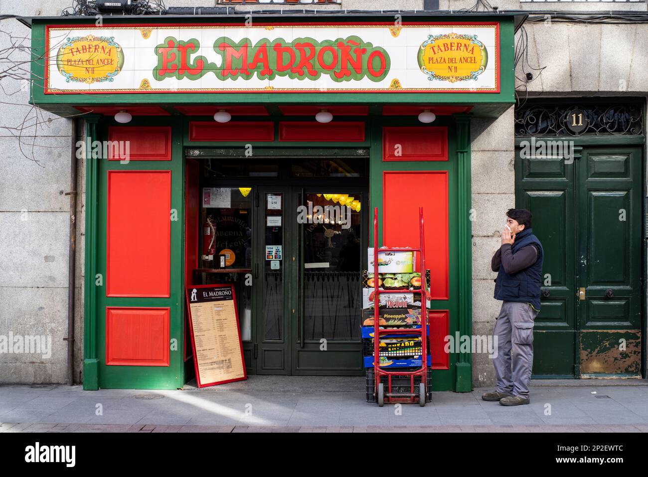 Bars, restaurants and traditional shops in Madrid, Spain Stock Photo ...