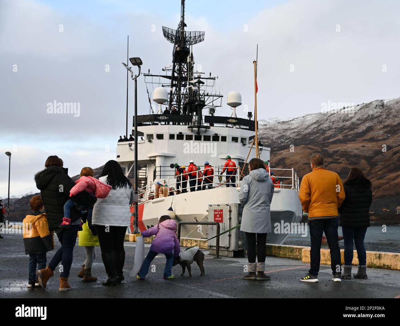 Family and friends welcome home the crew of the Coast Guard Cutter Alex ...