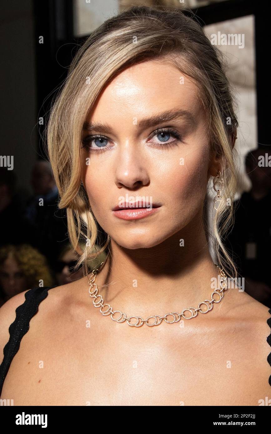 Leah McNamara poses for photographers at the Elie Saab Fall/Winter 2023 ...