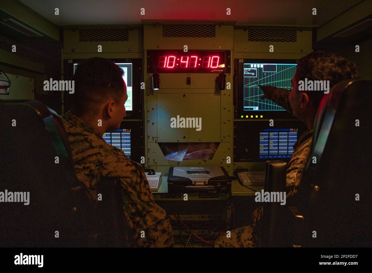 U.S. Marine Corps Lance Cpl. David Navarro, left, and Cpl. Henrry ...