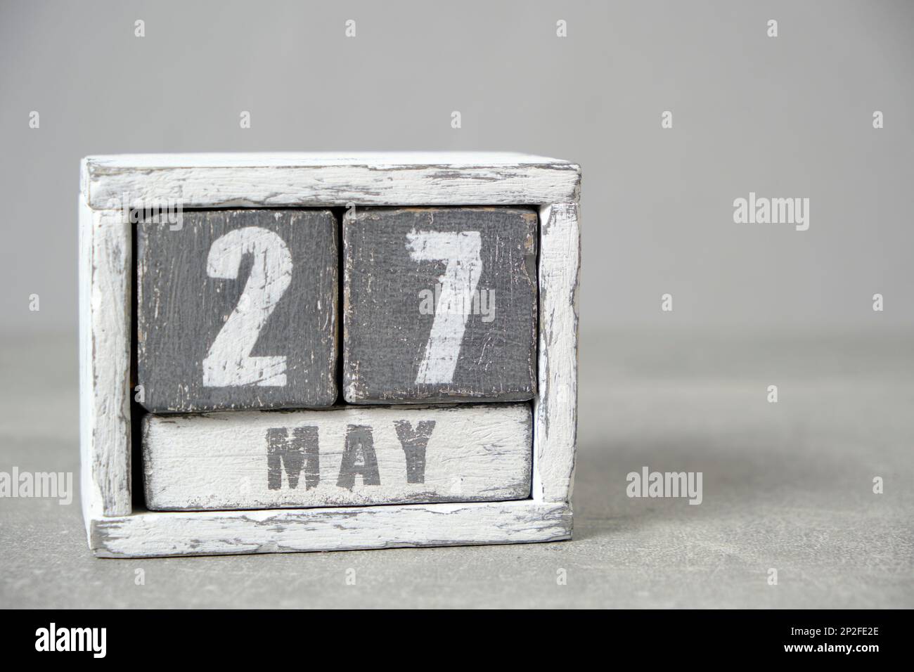 May 27 calendar made wooden cubes gray background.With an empty space ...