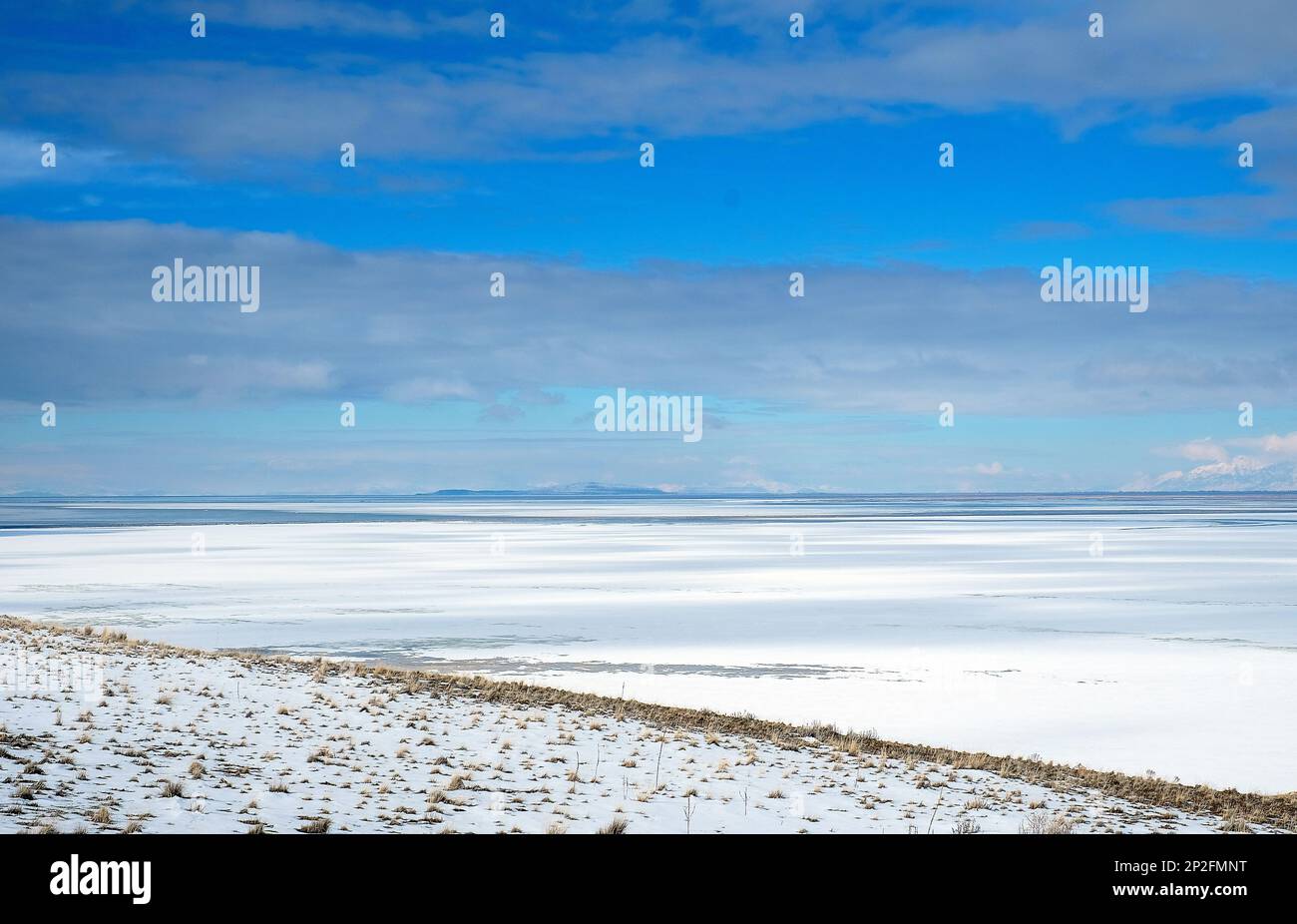 February 28, 2023: A snow covered receding shoreline along the Great ...