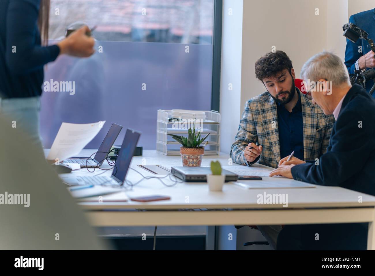 A junior worker has problems with his tasks. He asked for help his ...