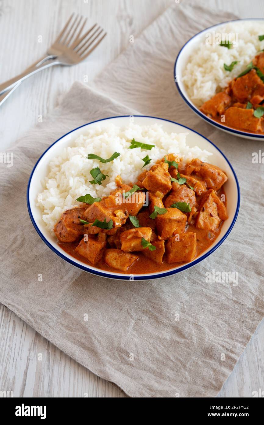 Homemade Easy Indian Butter Chicken with Rice on a Plate, low angle ...