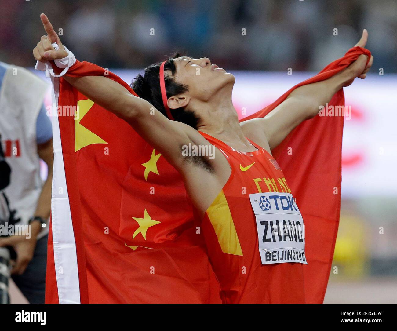 Men's high jump silver medalist China's Zhang Guowei celebrates at the ...