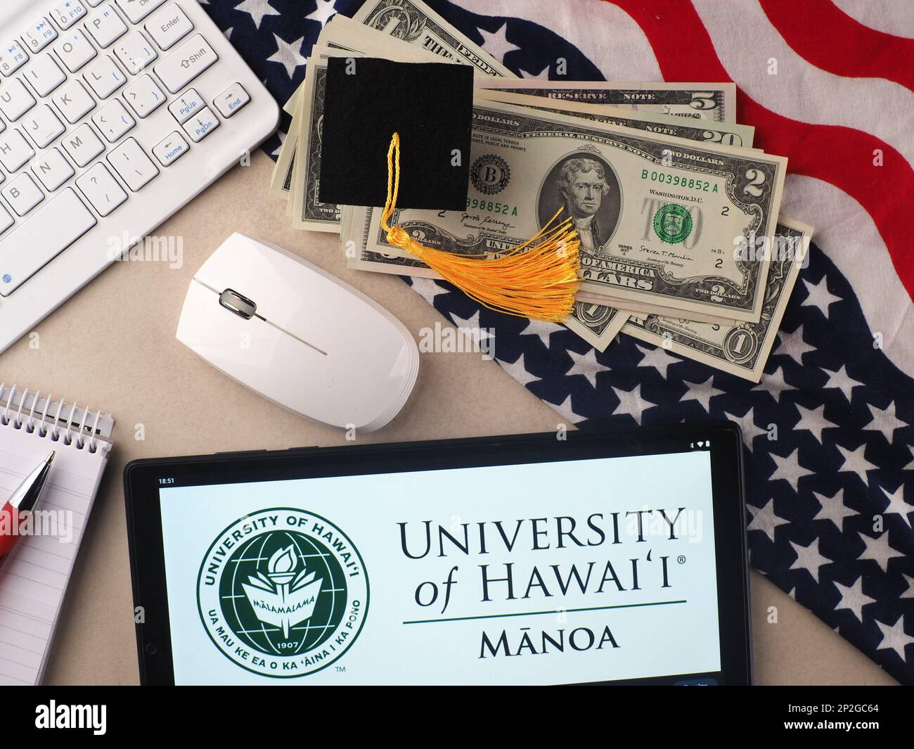 In this photo illustration, University of Hawai'i at Manoa logo seen ...