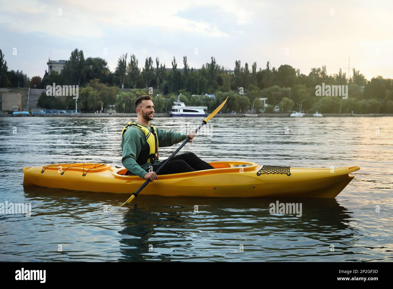 Handsome man kayaking in river. Summer activity Stock Photo - Alamy