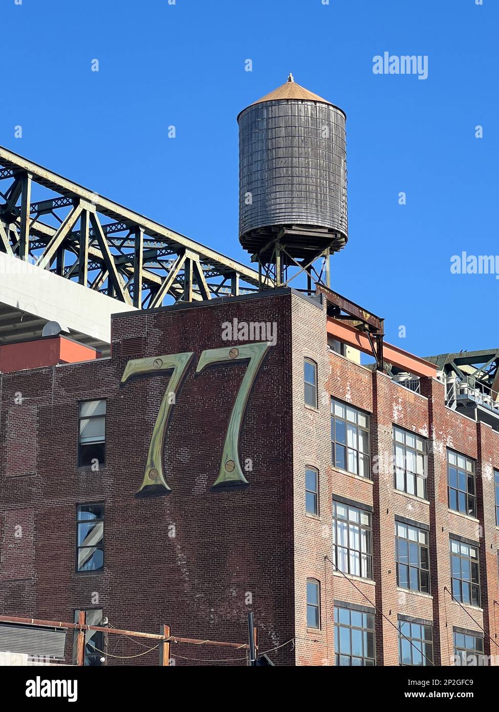 Roof watertower atop a warehouse typed building in the Gowanus section ...