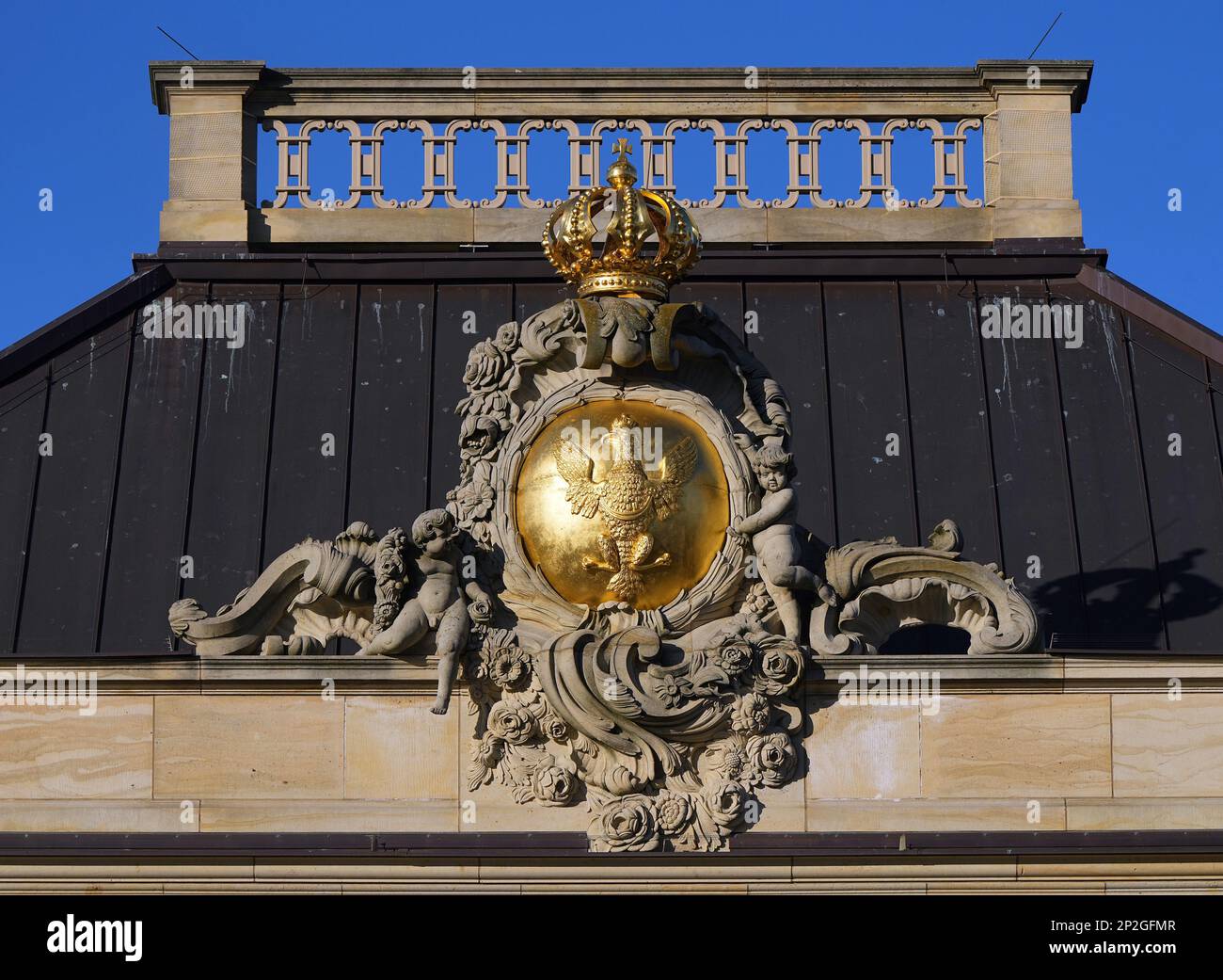 Potsdam, Germany. 01st Mar, 2023. The gilded coat of arms with stone ...