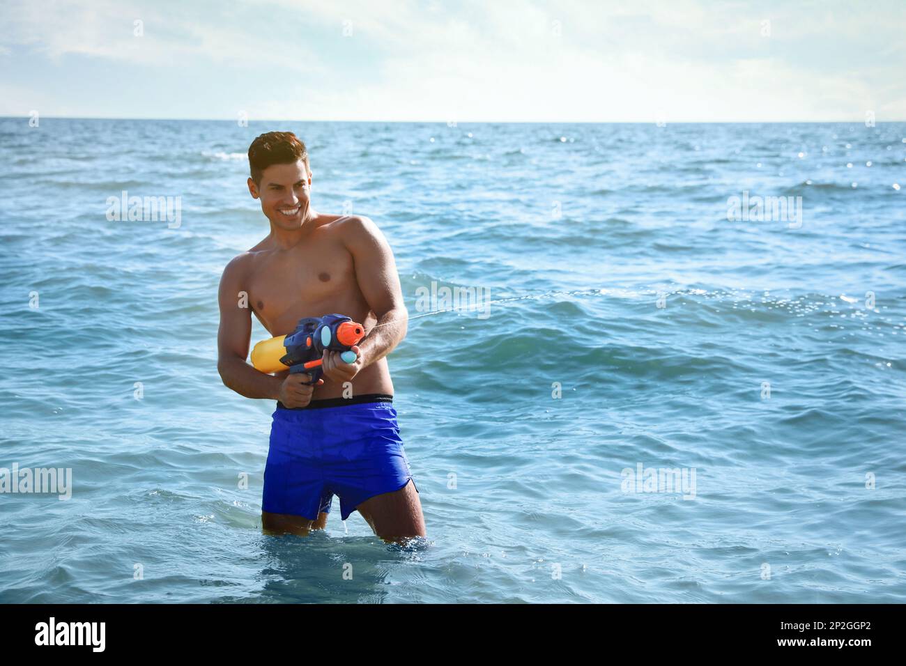 Man water gun hi-res stock photography and images - Alamy