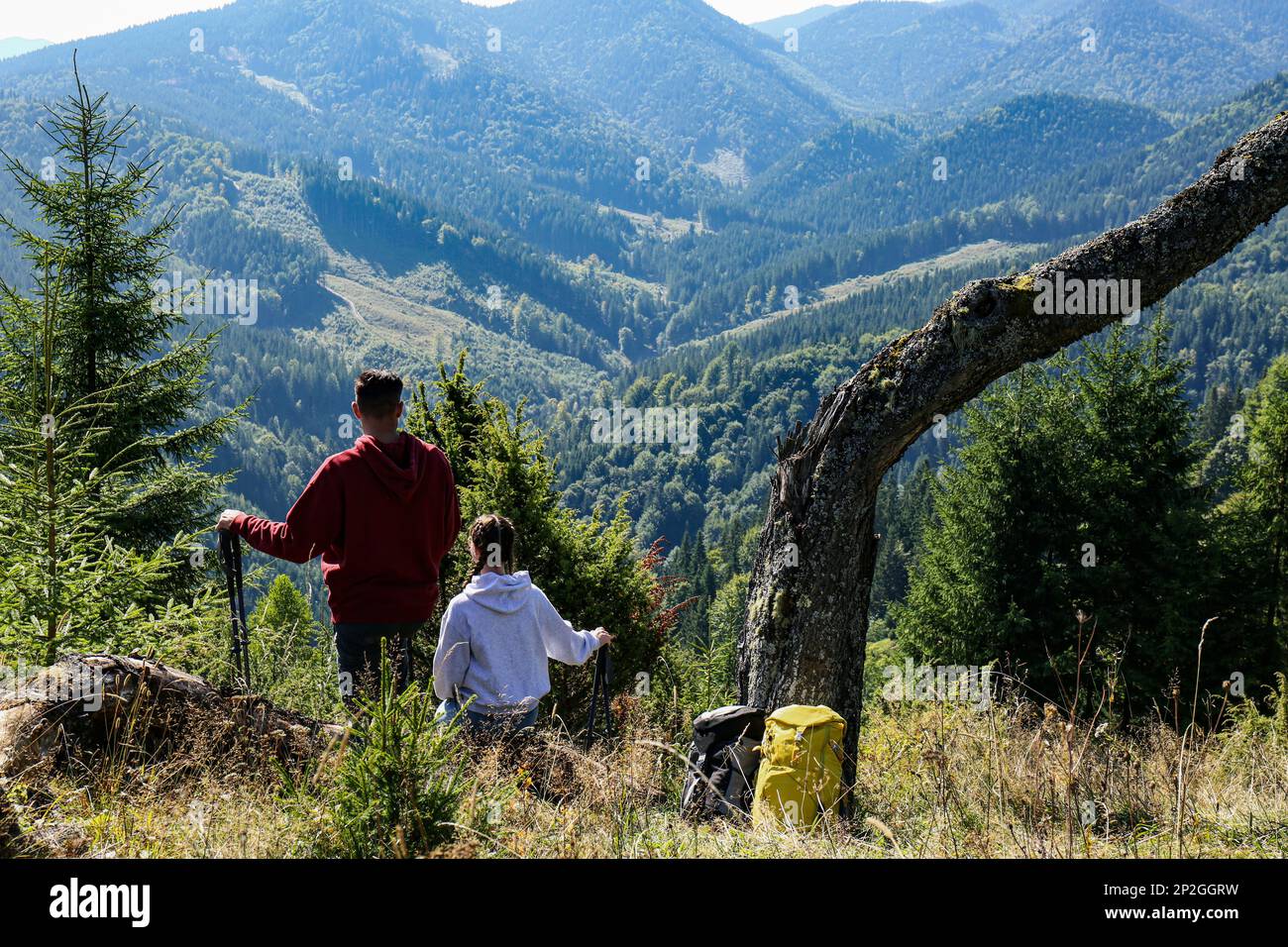 Back view couple backpacking in hi-res stock photography and images - Alamy