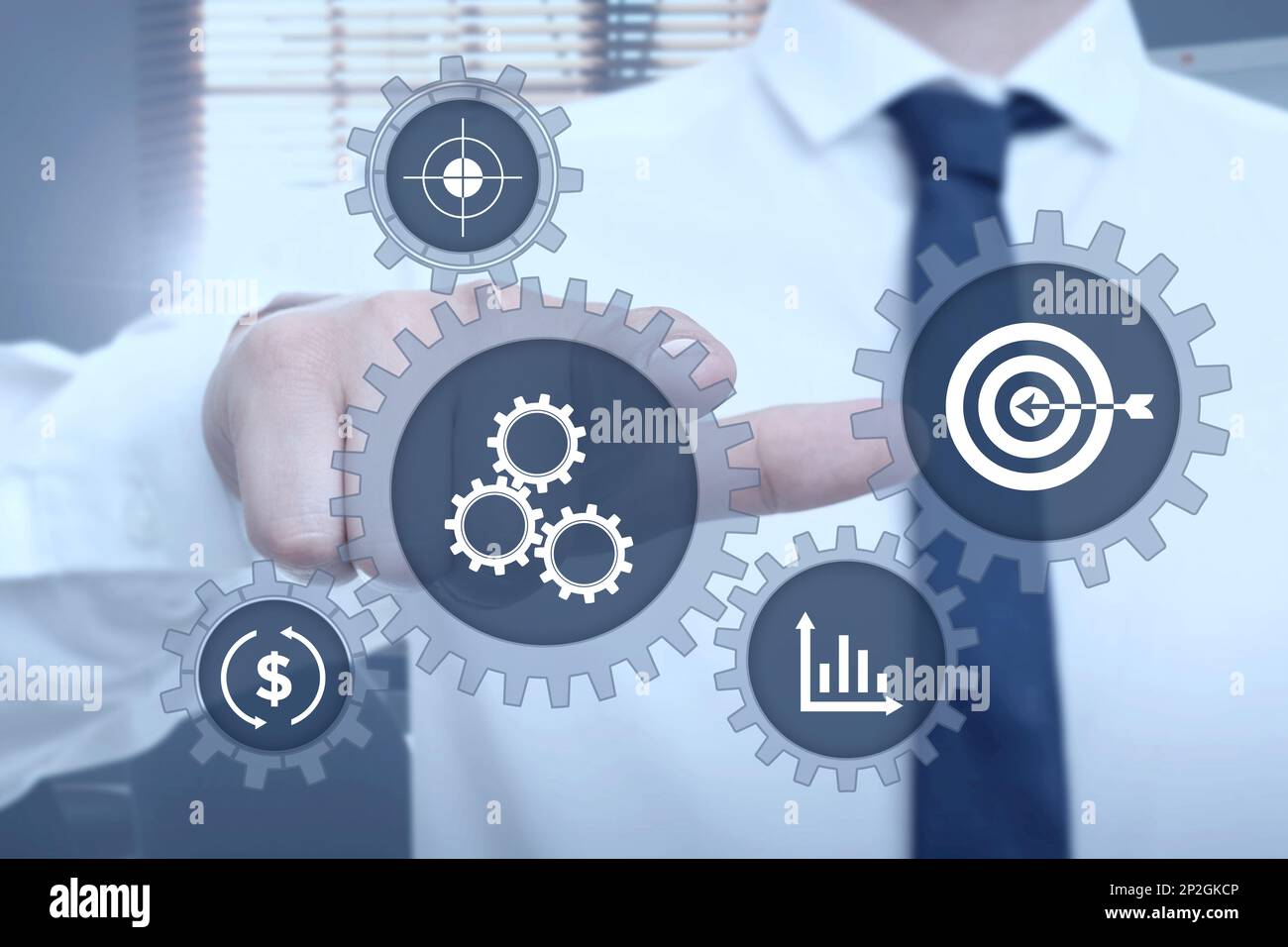 Business process. Man touching virtual screen with different icons in ...