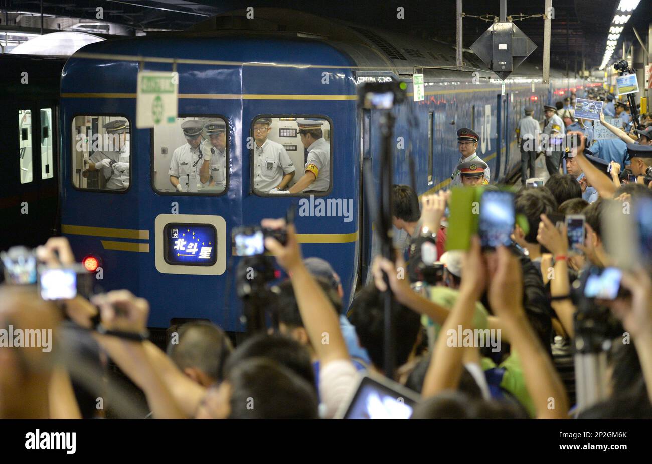 A blue Hokutosei train pulls into Ueno Station in Tokyo on Sunday ...