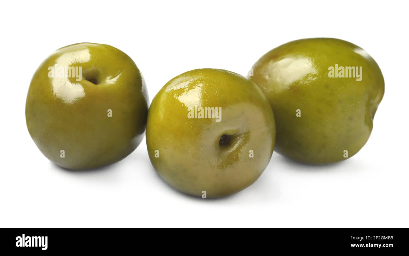 Three fresh green olives on white background Stock Photo - Alamy