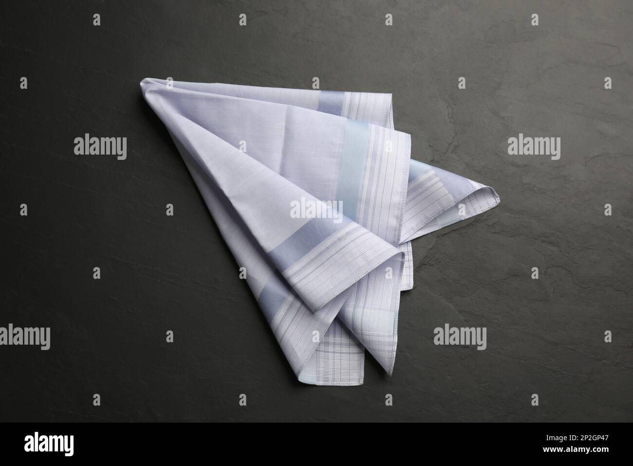 Handkerchief with pattern on black table, top view Stock Photo - Alamy