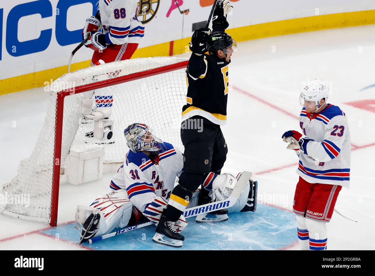 Boston Bruins' Tomas Nosek, center, celebrates his goal past New York ...