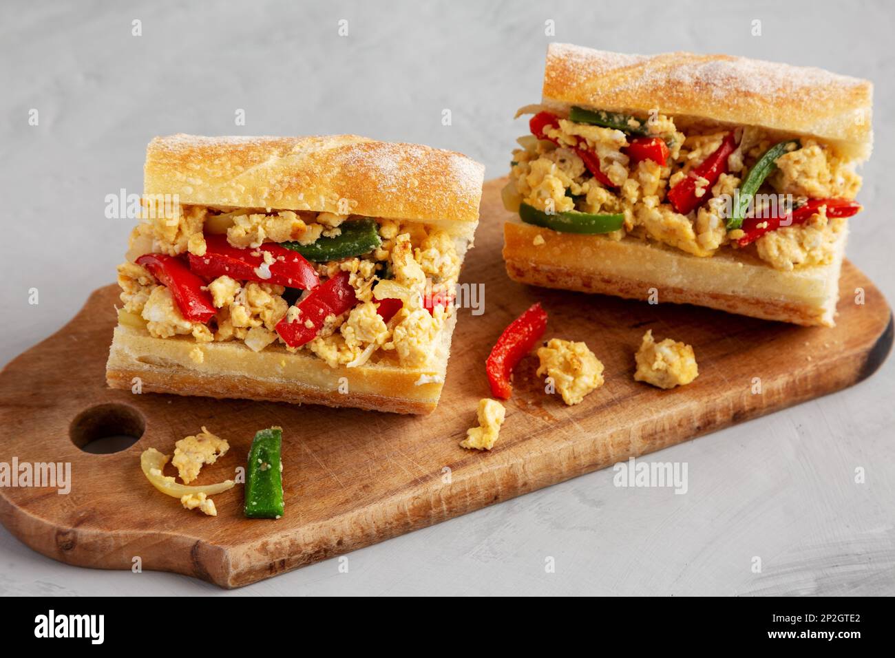 Homemade Easter Pepper and Egg Sandwich on a rustic wooden board, side ...