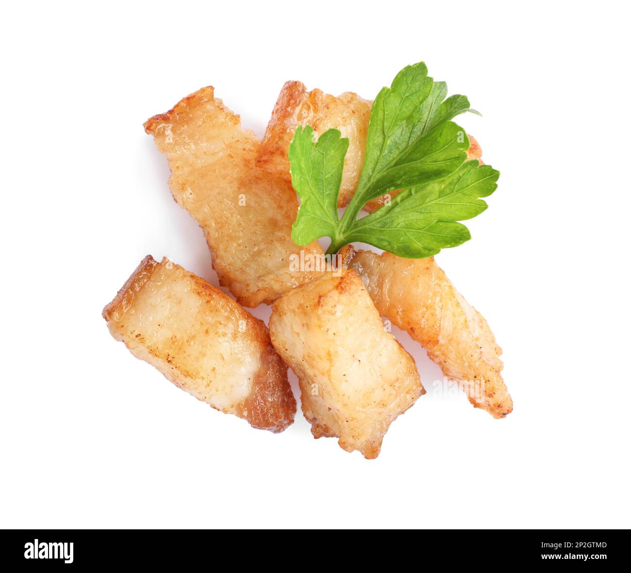 Tasty fried cracklings with parsley on white background, top view ...